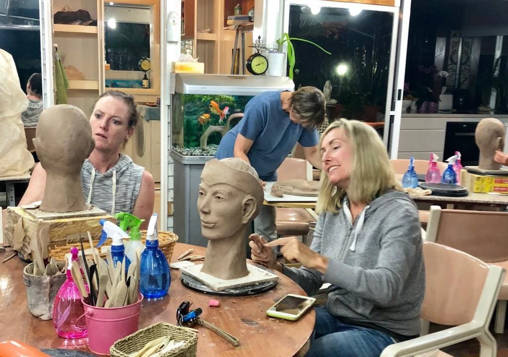 Sculpting in the art class, students learning the art of it ...